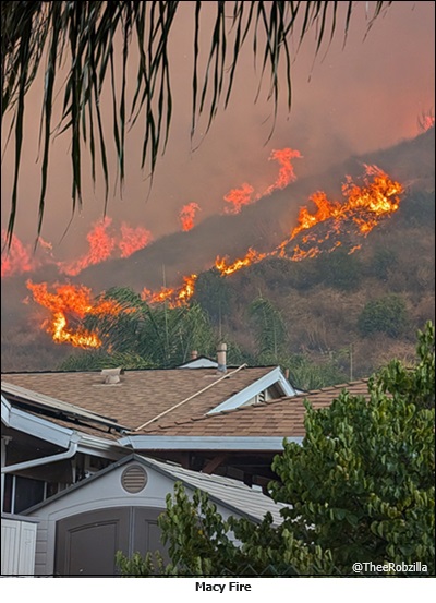 INT: Evacuation warnings lifted as new fires contained